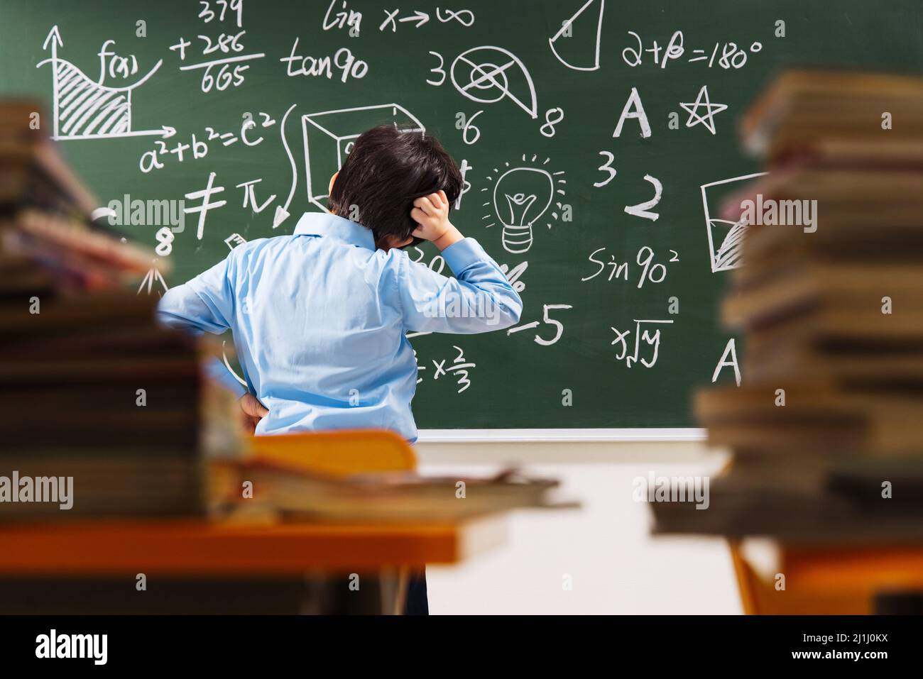 The back of elementary school boys were math problem difficult Stock ...