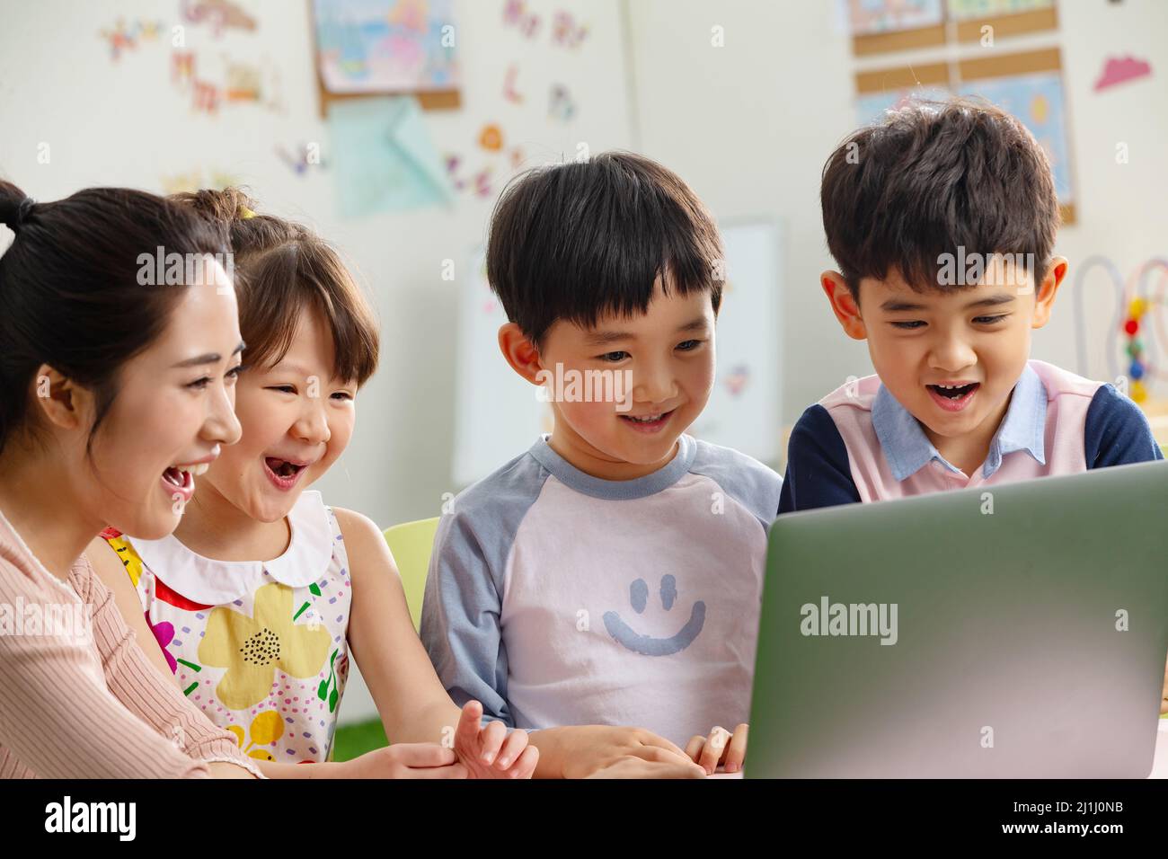 The kindergarten children watch video Stock Photo - Alamy