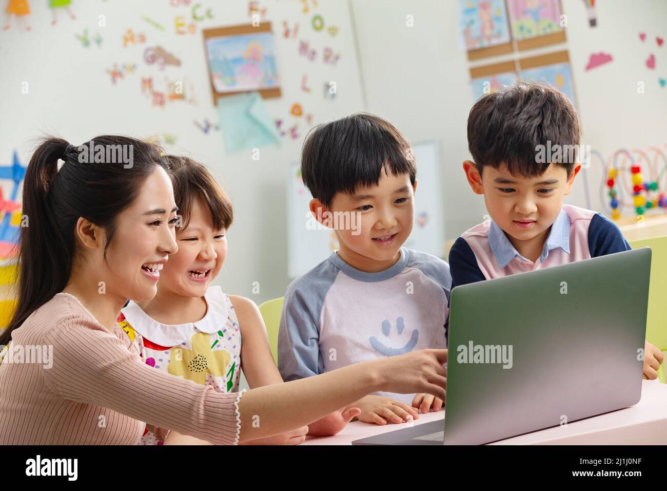 The kindergarten children watch video Stock Photo - Alamy