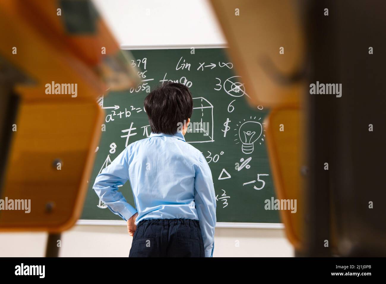 Children back rear uniform school hi-res stock photography and images ...