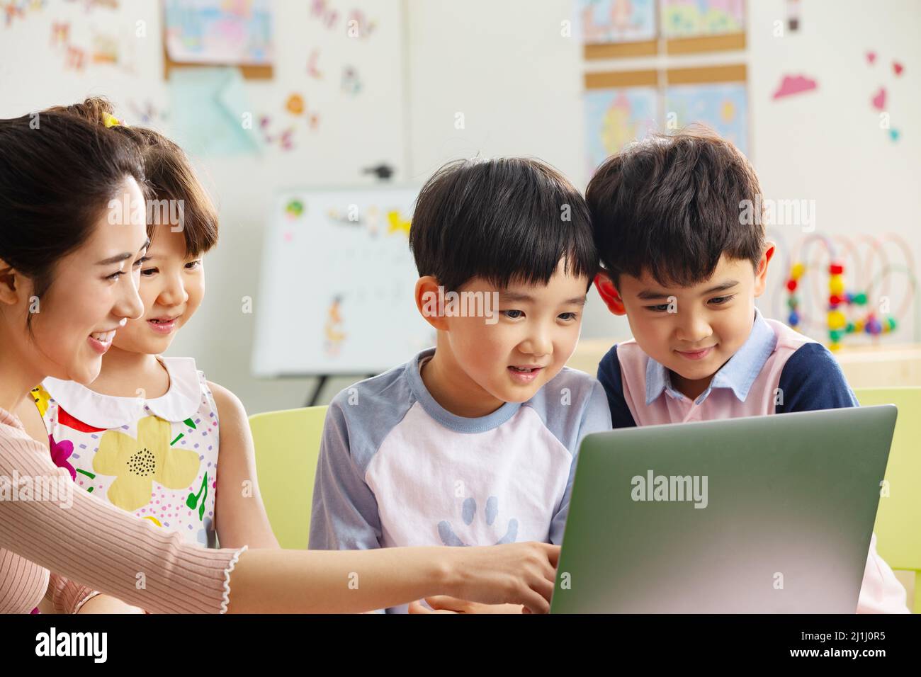 The kindergarten children watch video Stock Photo - Alamy