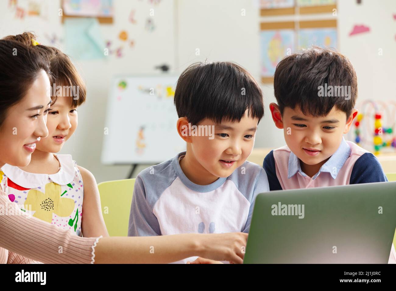 The kindergarten children watch video Stock Photo - Alamy