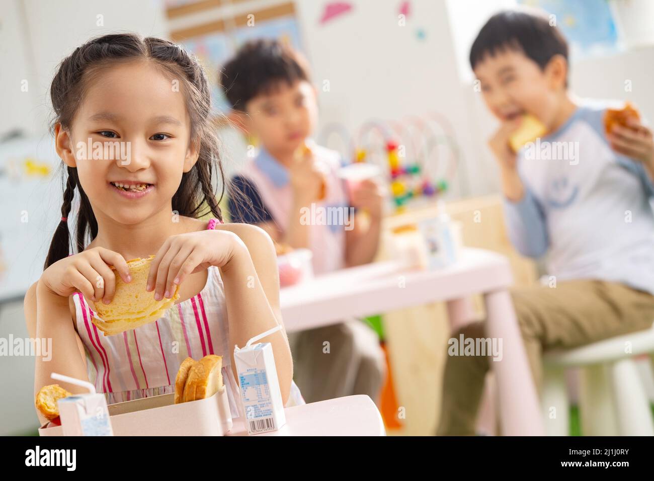 China children drink milk hi-res stock photography and images - Alamy