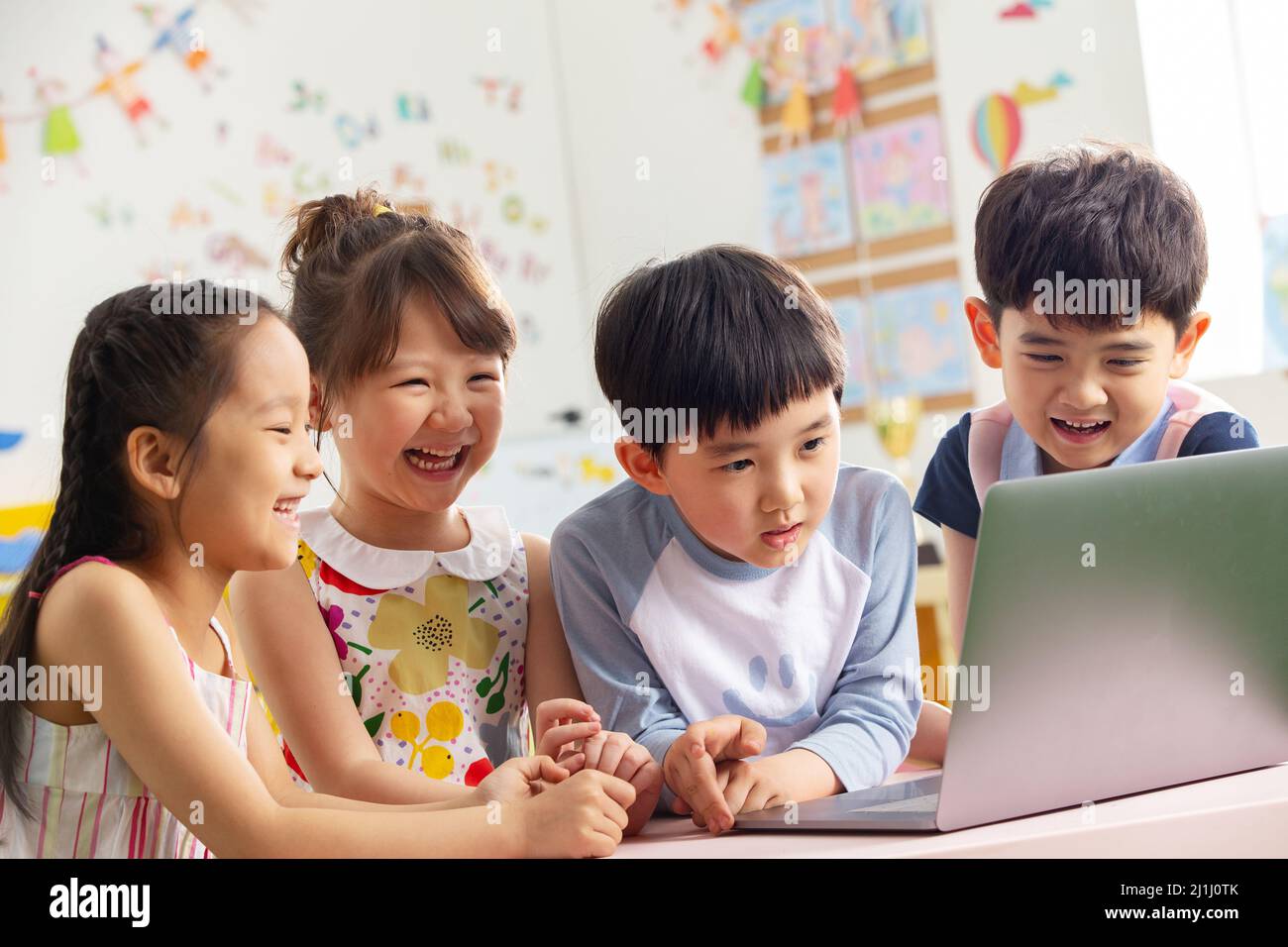 The kindergarten children watch video Stock Photo - Alamy