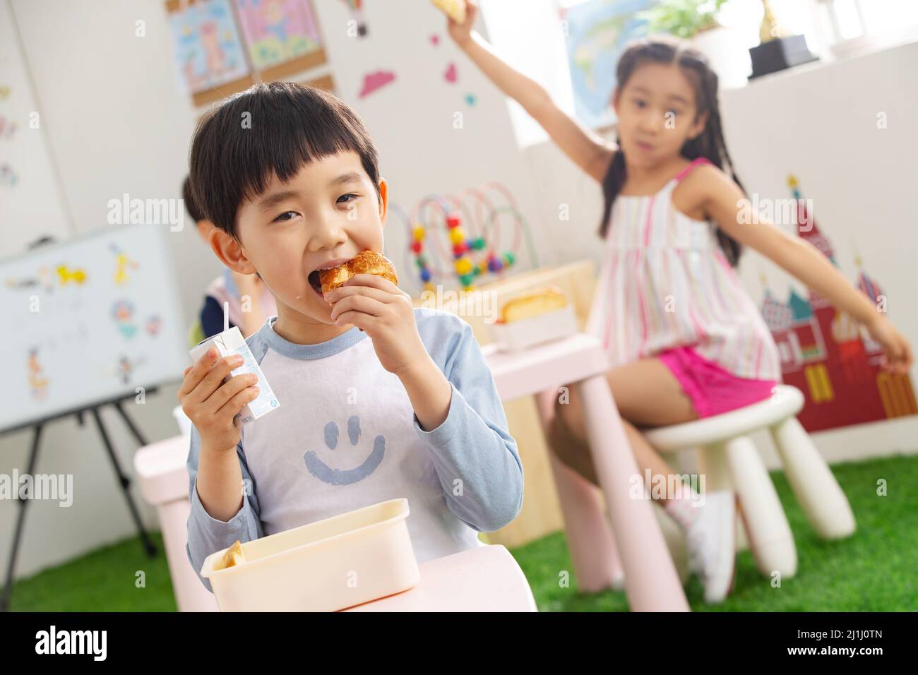 China children drink milk hi-res stock photography and images - Alamy