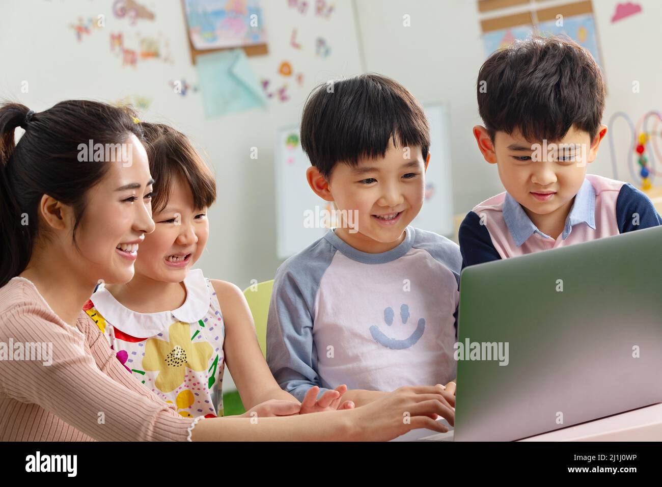 The kindergarten children watch video Stock Photo - Alamy