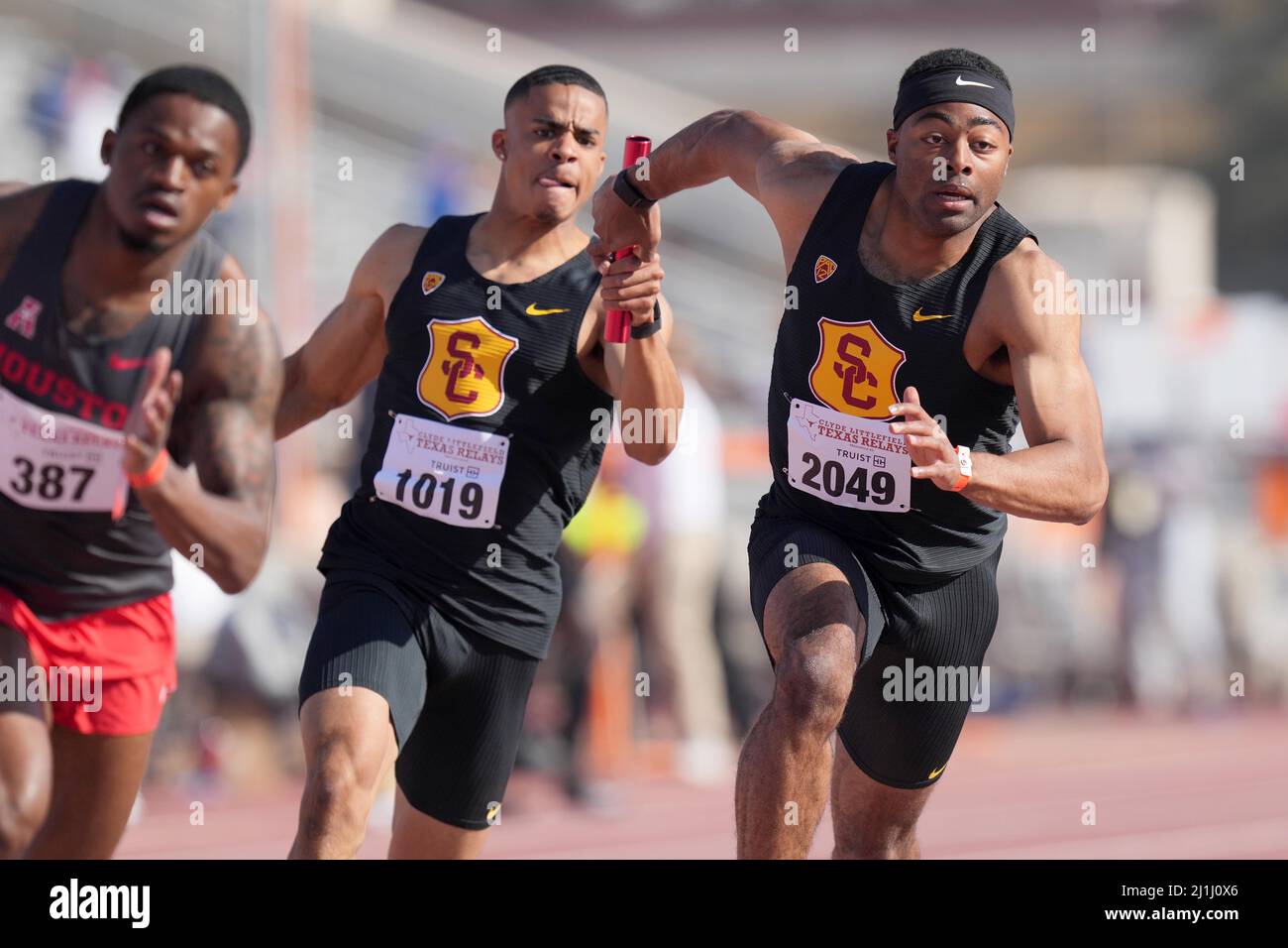 Eric Allen Jr. (2049) takes the handoff from Brendon Stewart (1019) on ...