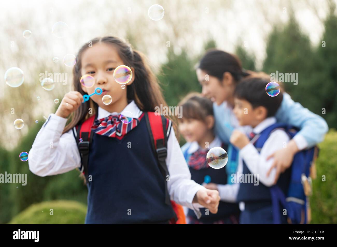 The children blow bubbles Stock Photo - Alamy