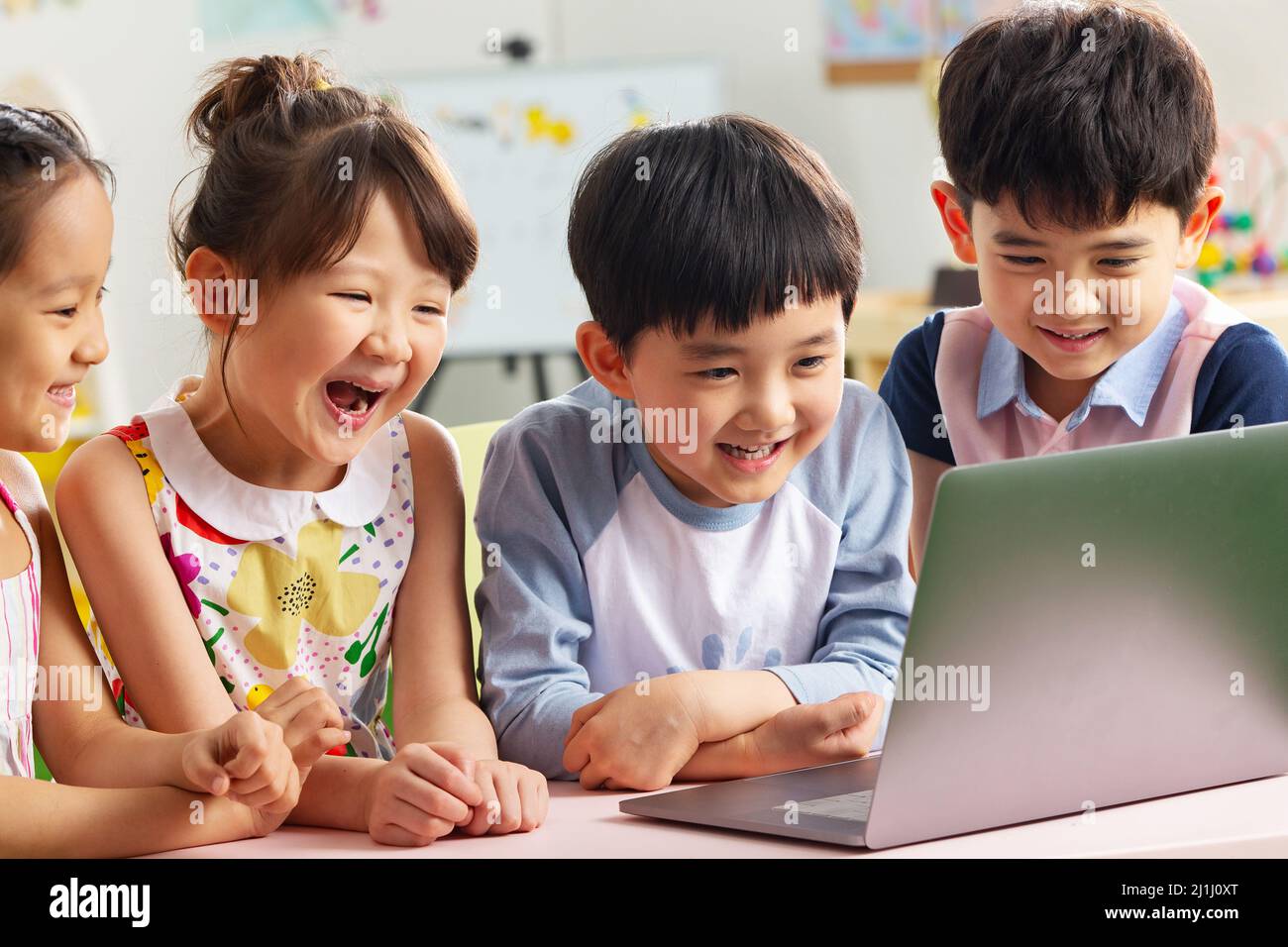 The kindergarten children watch video Stock Photo - Alamy