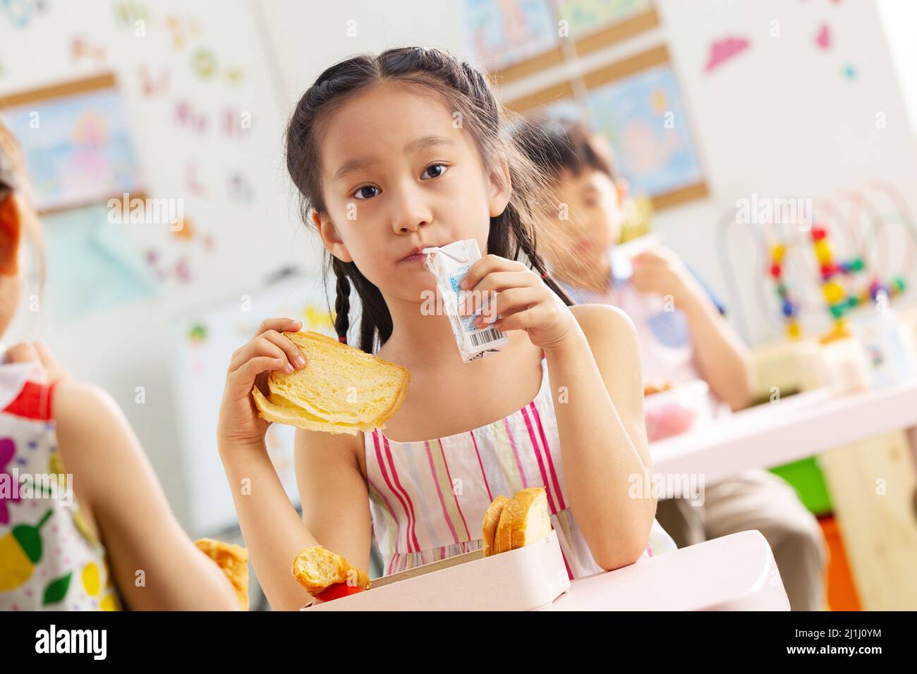 China children drink milk hi-res stock photography and images - Alamy