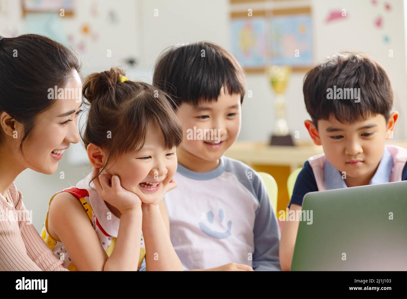 The kindergarten children watch video Stock Photo - Alamy