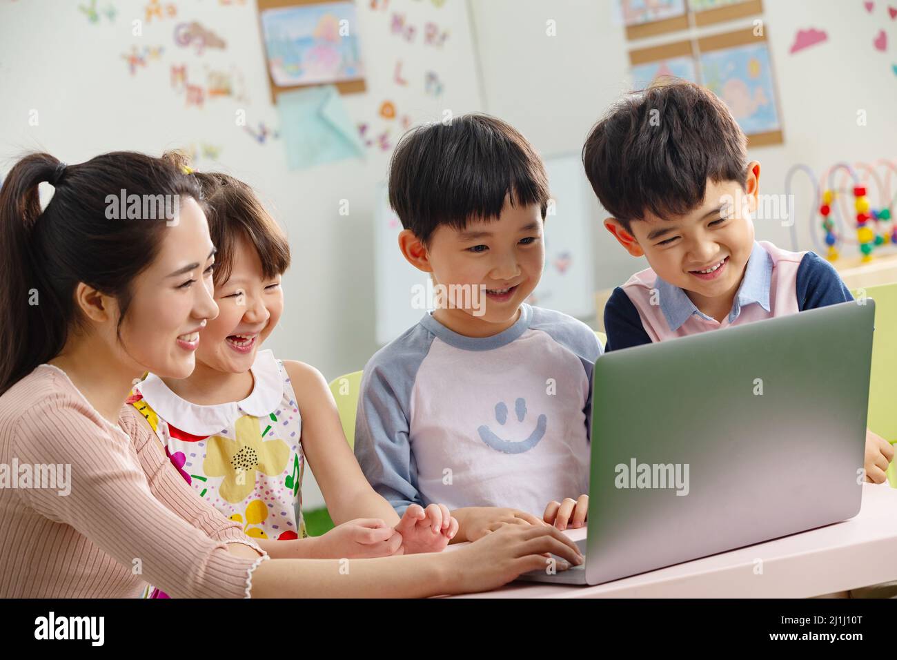 The kindergarten children watch video Stock Photo - Alamy