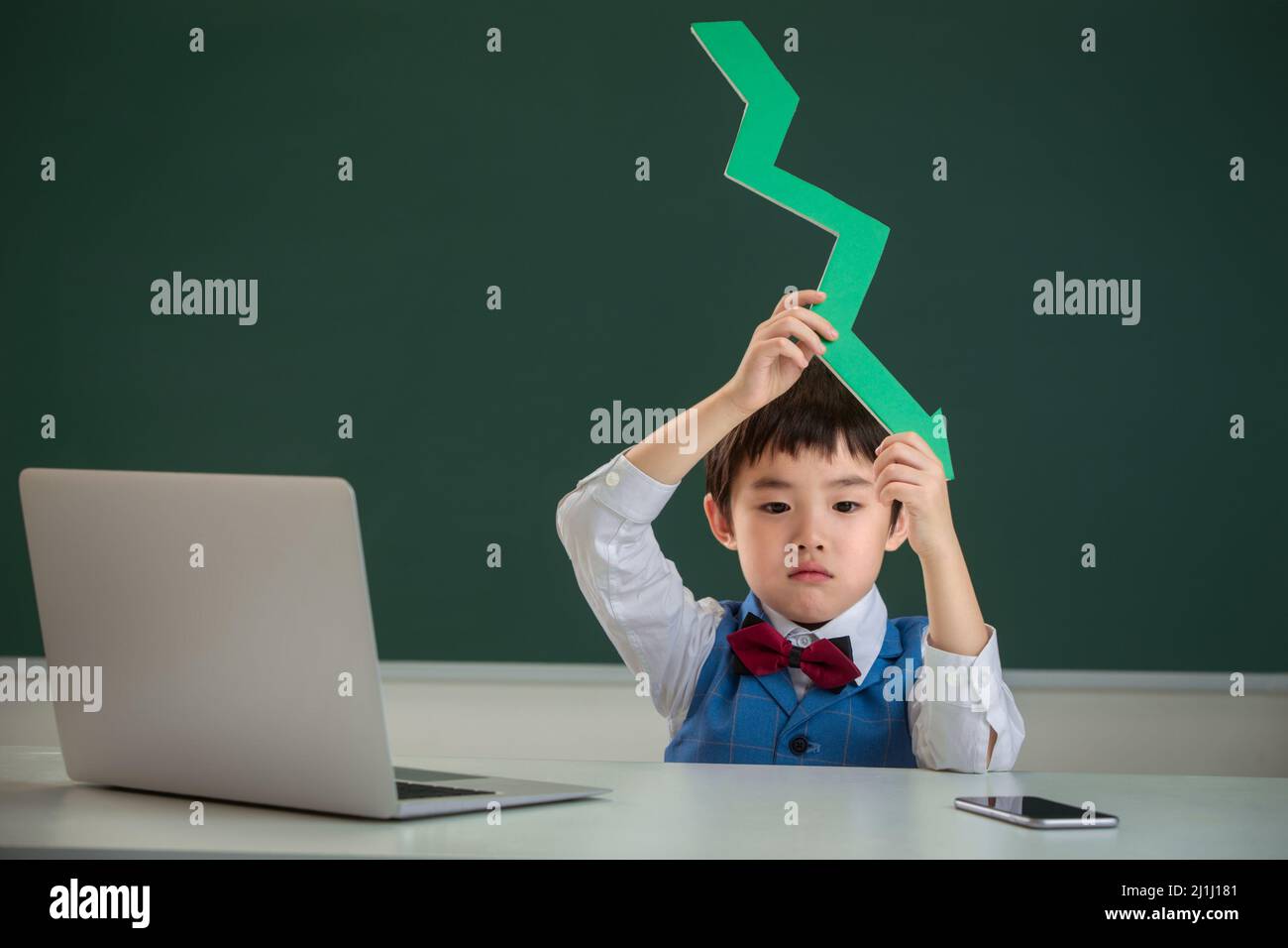 Elementary school students online learning Stock Photo - Alamy