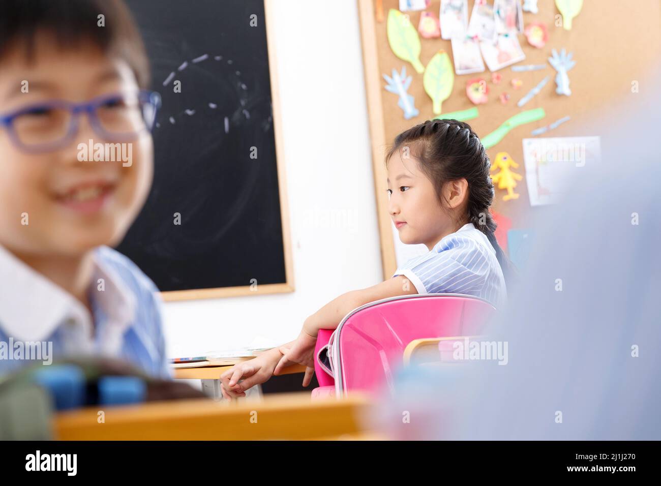 Elementary school students in the classroom Stock Photo - Alamy