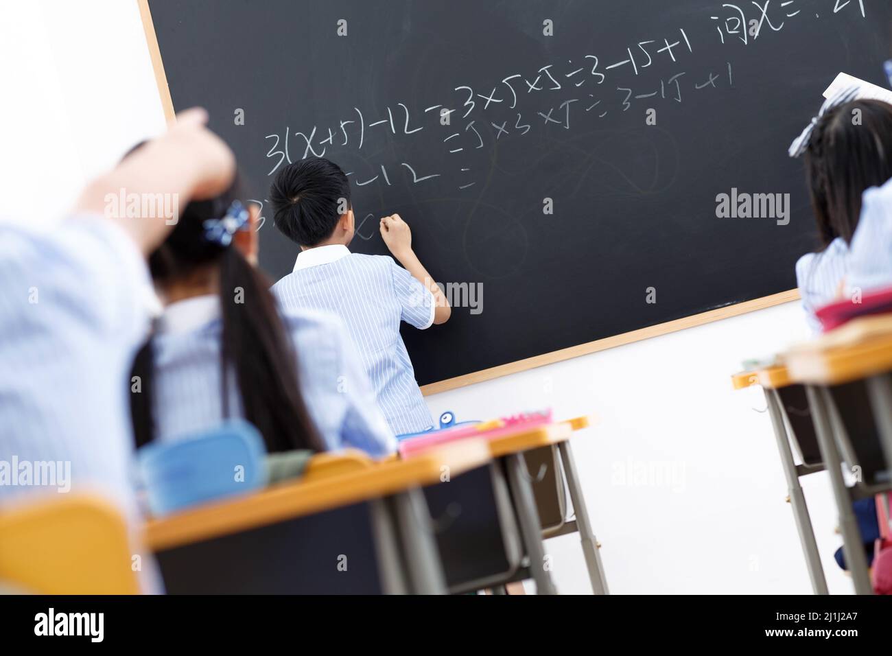 Elementary school students in the classroom Stock Photo - Alamy