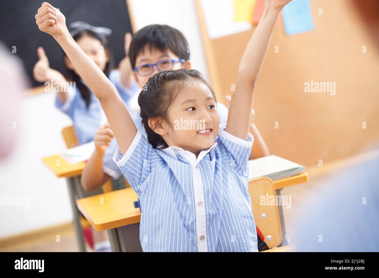 Elementary school students in the classroom Stock Photo - Alamy