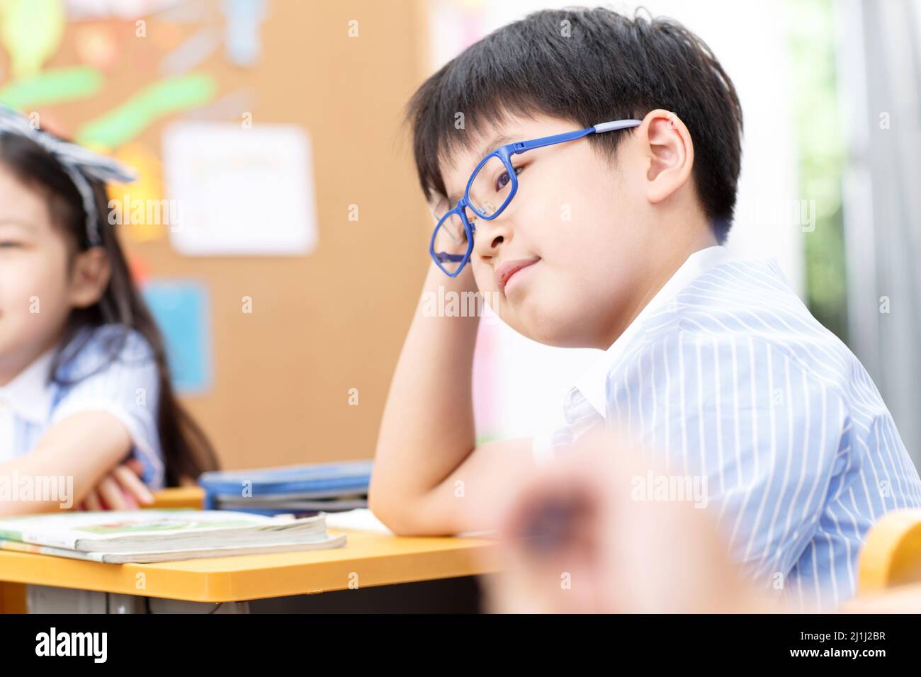 Elementary school students in the classroom Stock Photo - Alamy