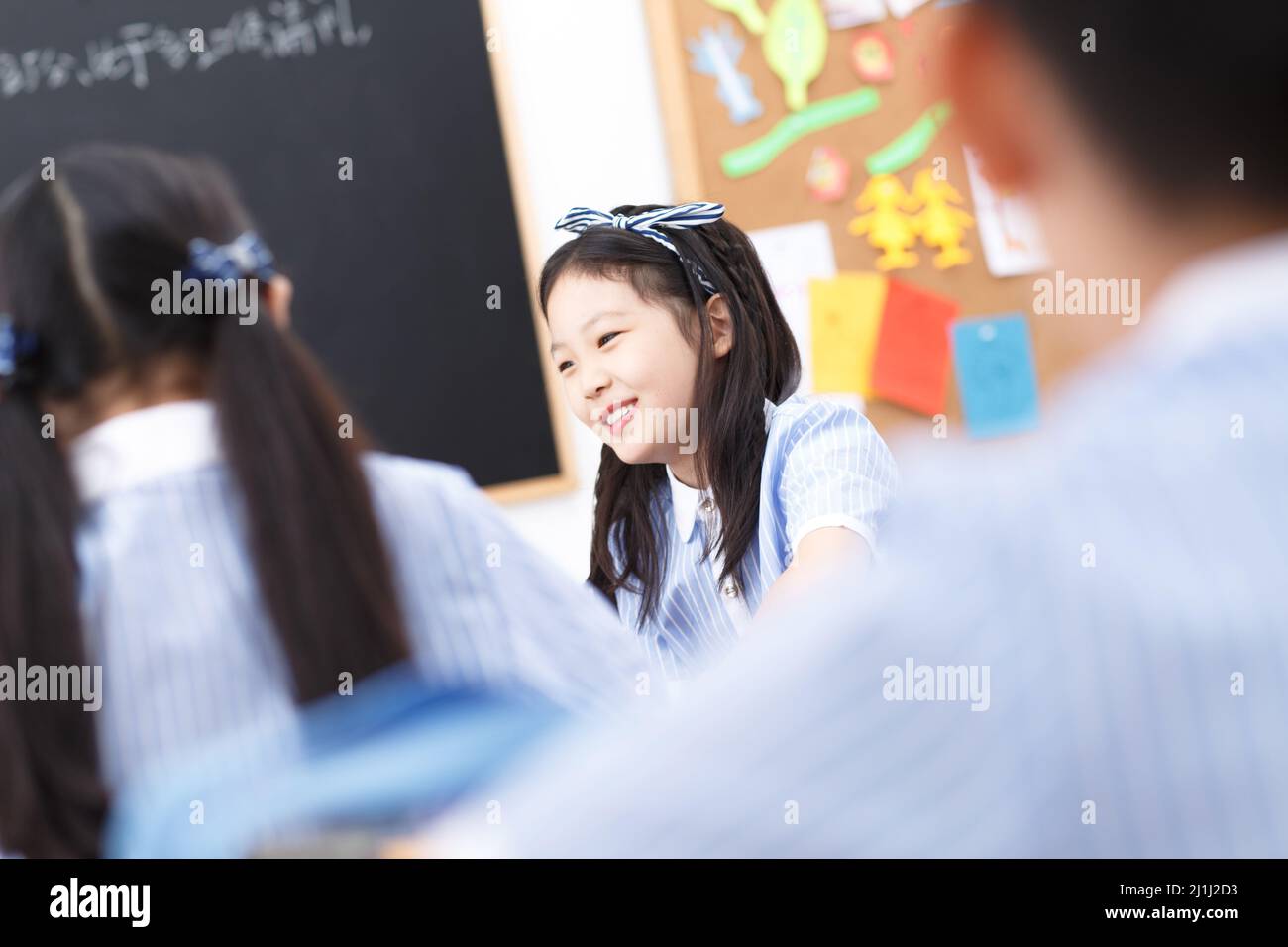 Elementary school students in the classroom Stock Photo - Alamy