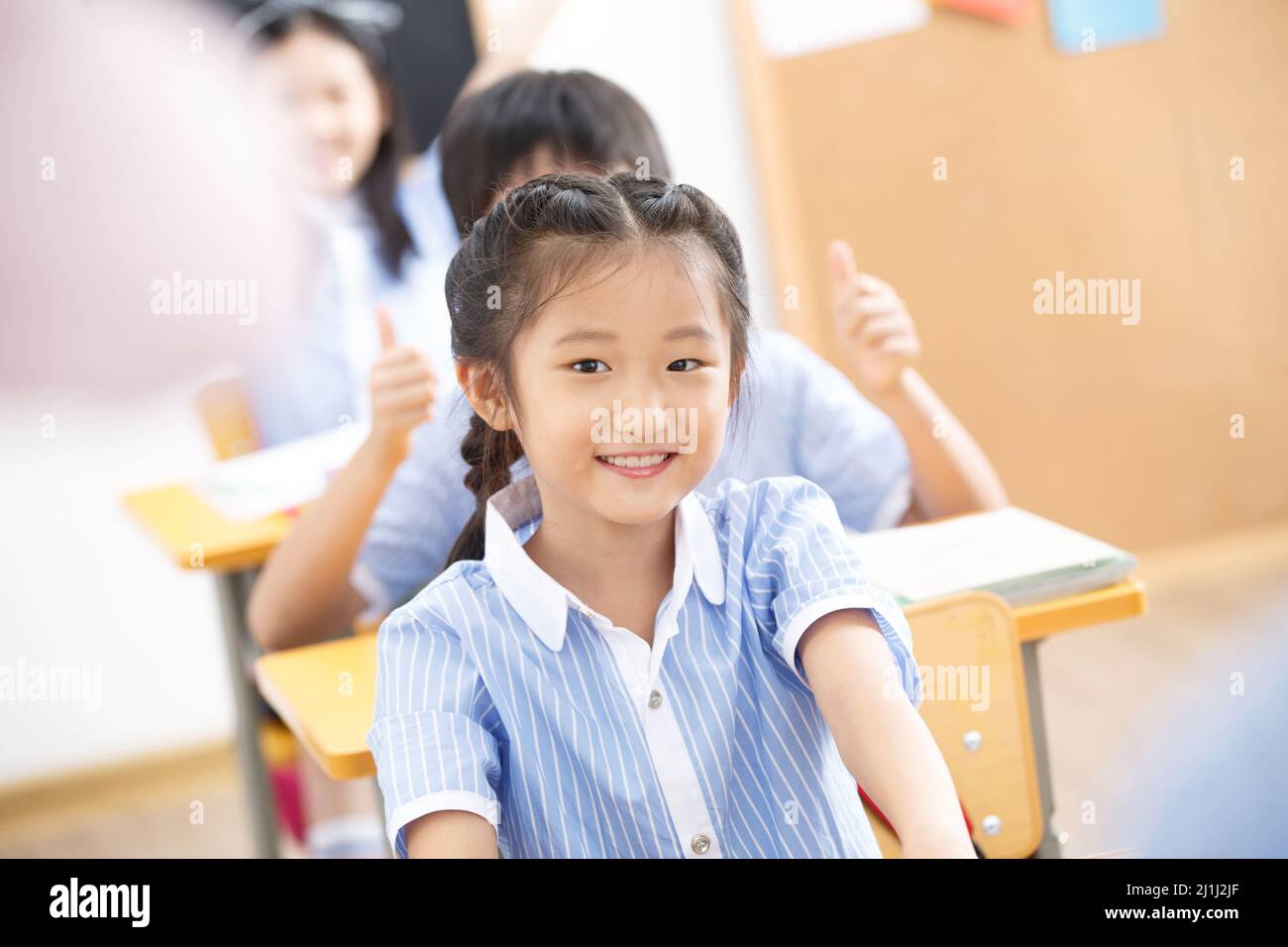 Elementary school students in the classroom Stock Photo - Alamy