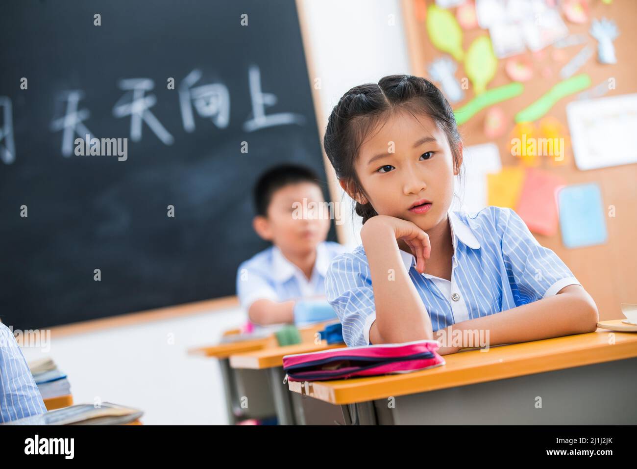 Elementary school students in the classroom Stock Photo - Alamy