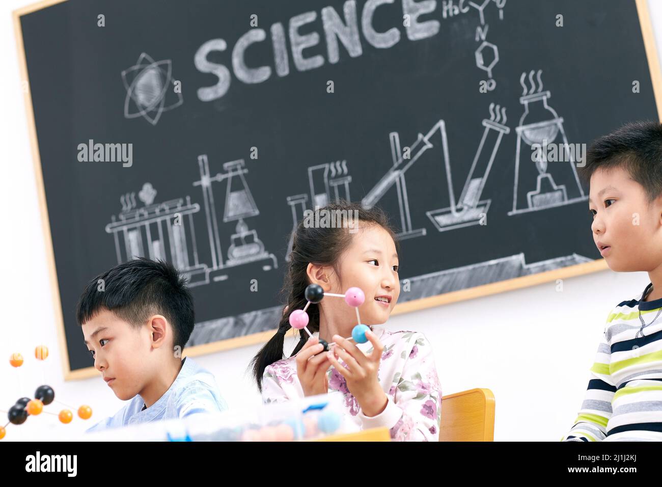 Elementary school students in the classroom Stock Photo - Alamy