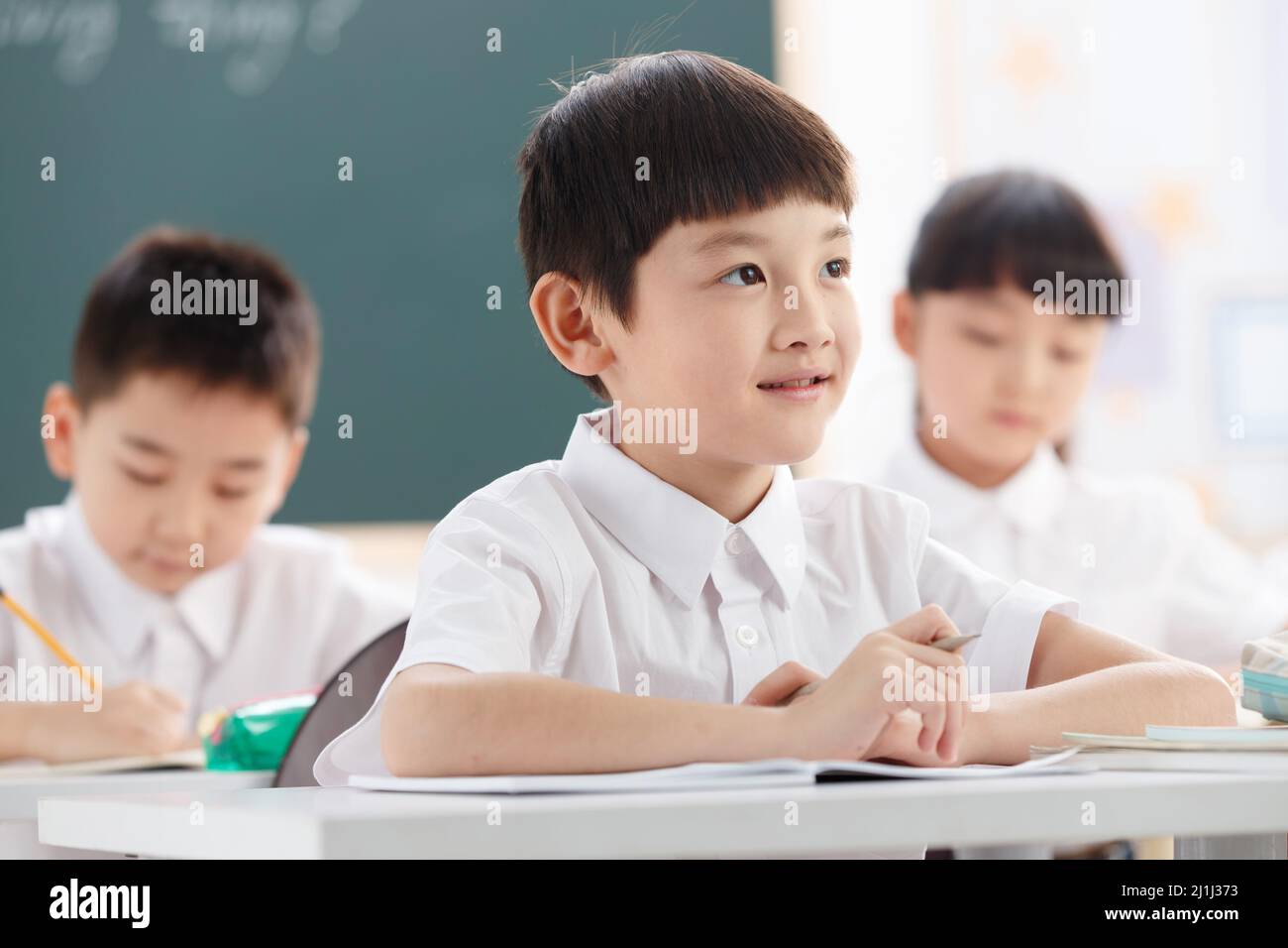 Pupils are learning in the classroom Stock Photo - Alamy
