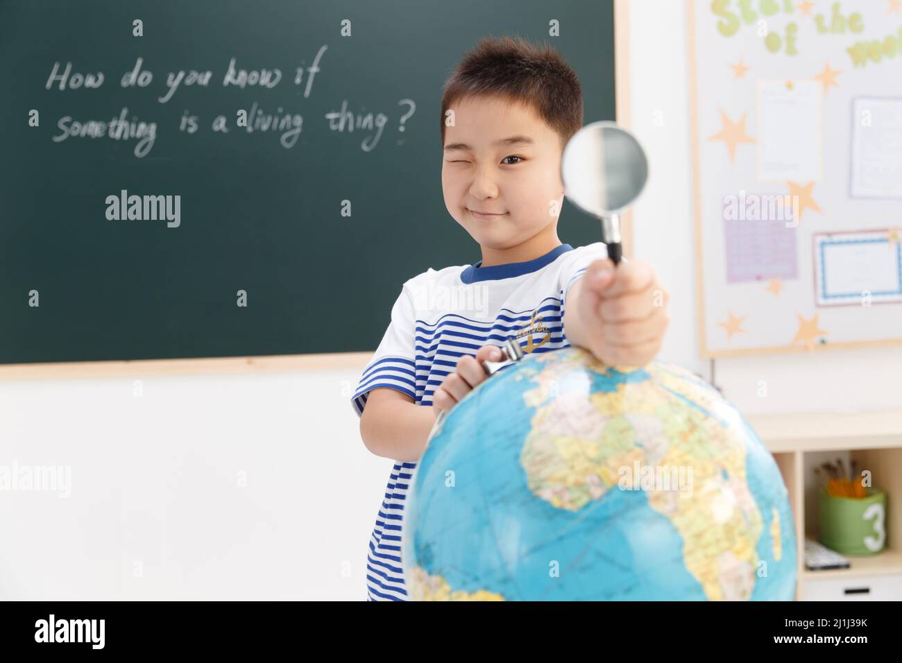 Primary school boys in the classroom Stock Photo - Alamy