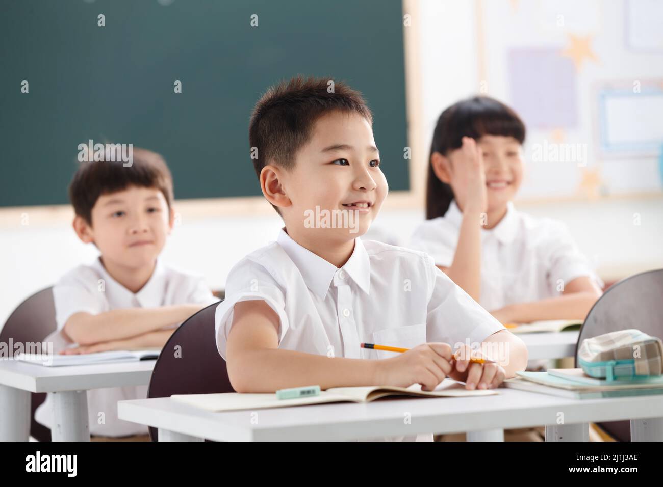 Pupils are learning in the classroom Stock Photo - Alamy