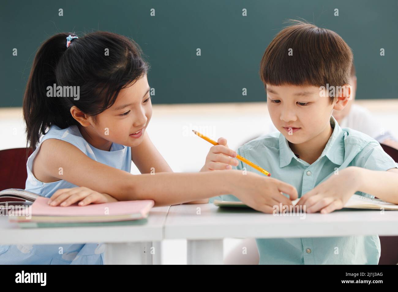 Pupils are learning in the classroom Stock Photo - Alamy
