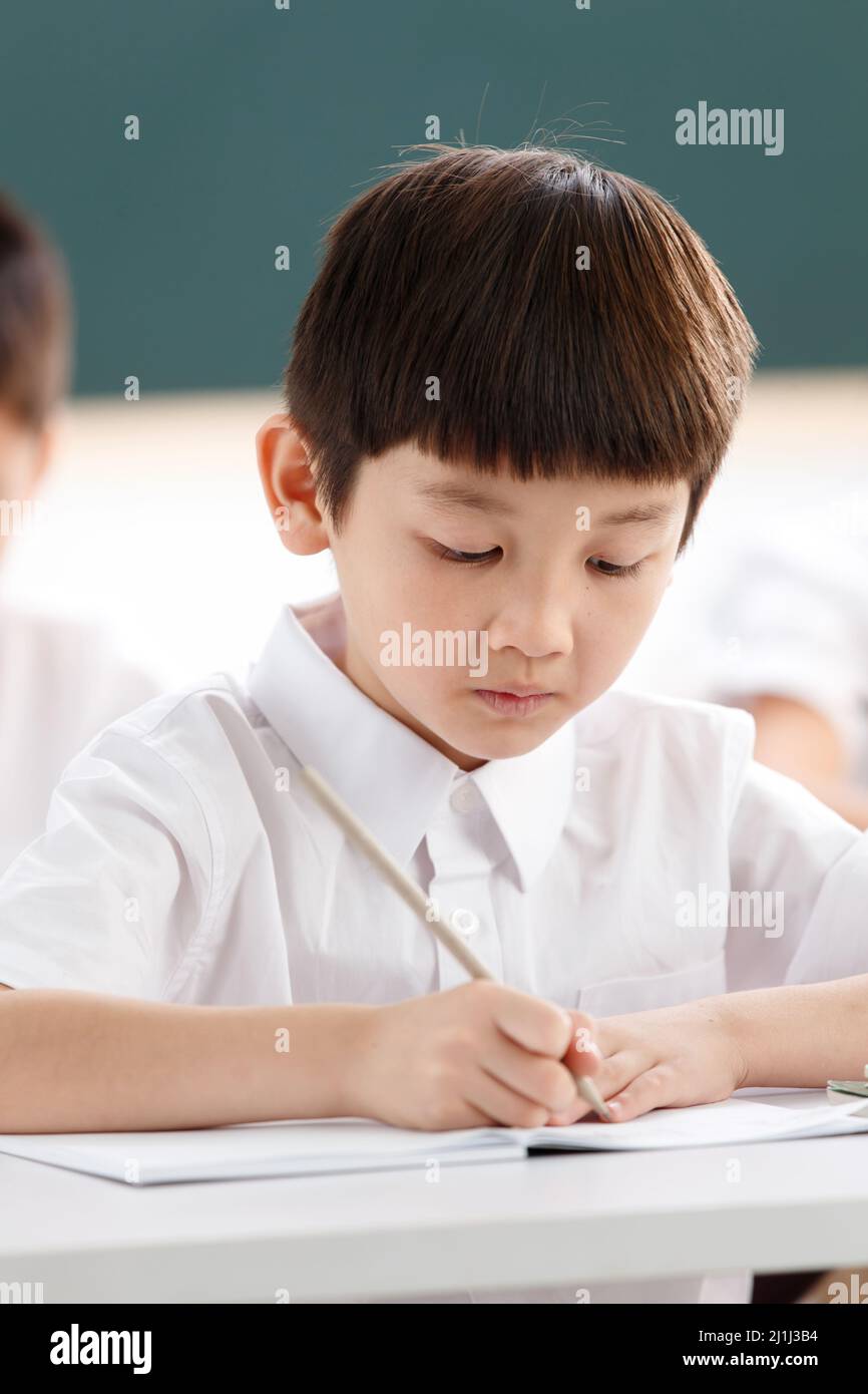 Boys learn hi-res stock photography and images - Alamy