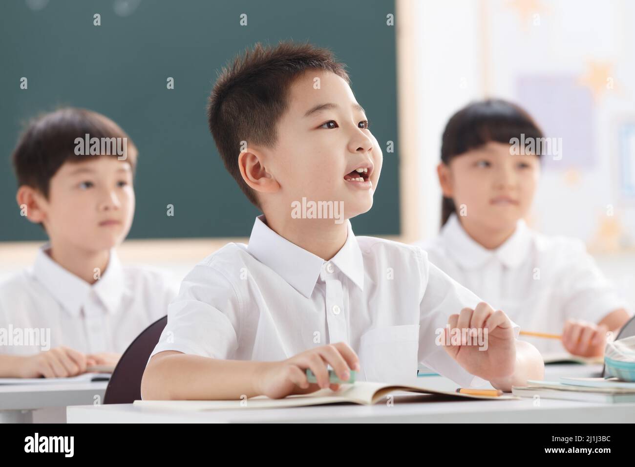 Pupils are learning in the classroom Stock Photo - Alamy