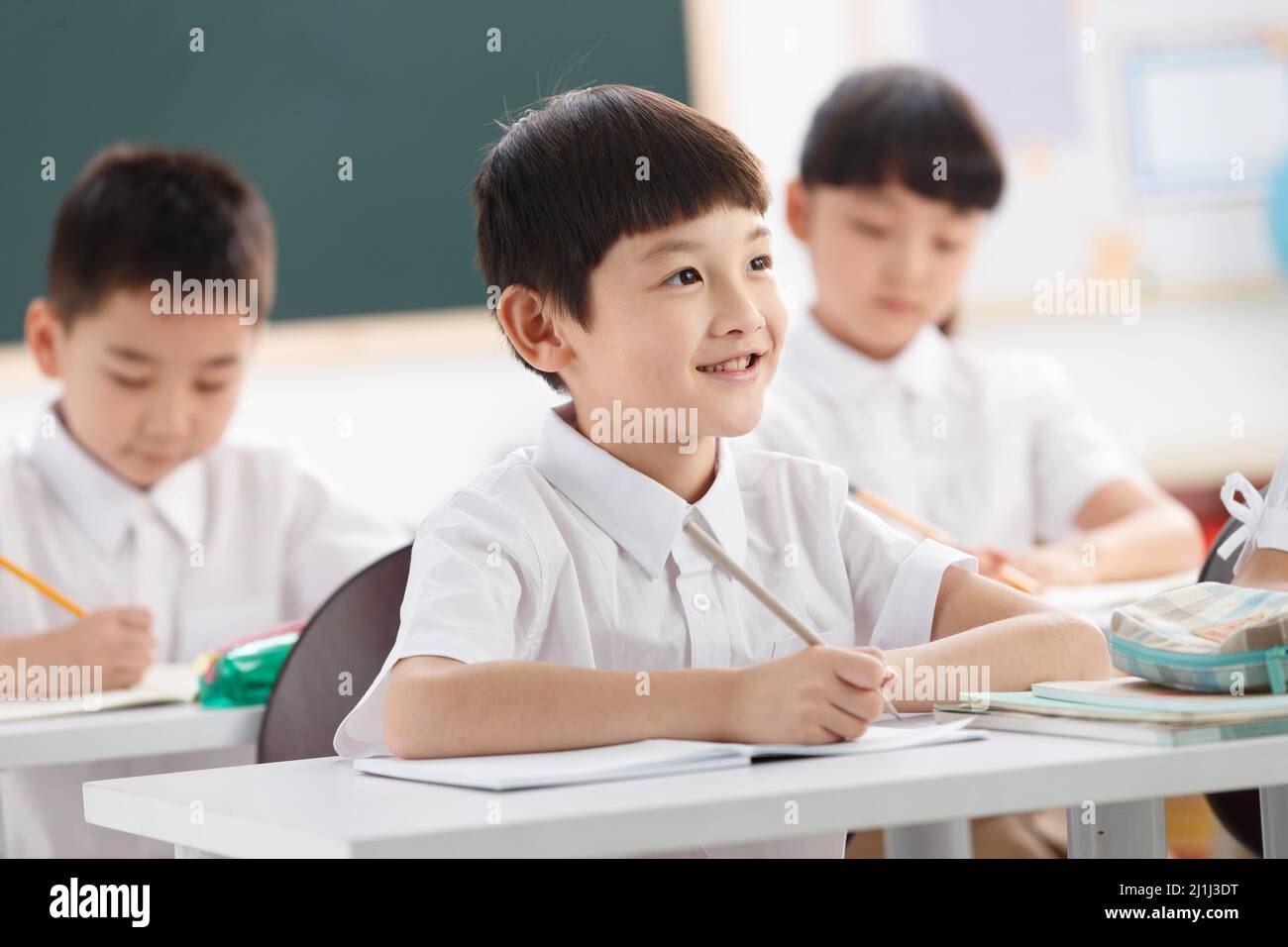 Pupils are learning in the classroom Stock Photo - Alamy