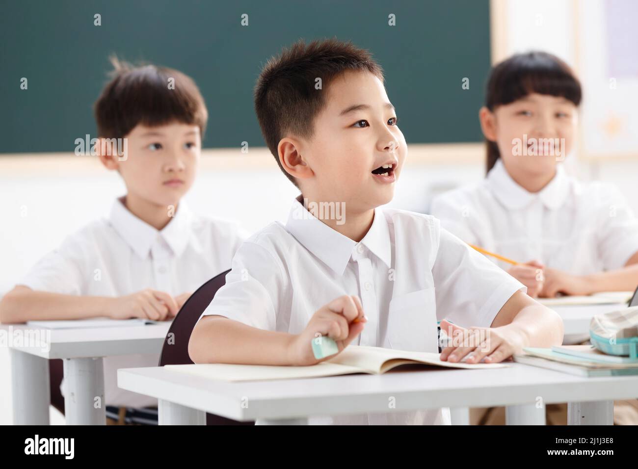 Pupils are learning in the classroom Stock Photo - Alamy