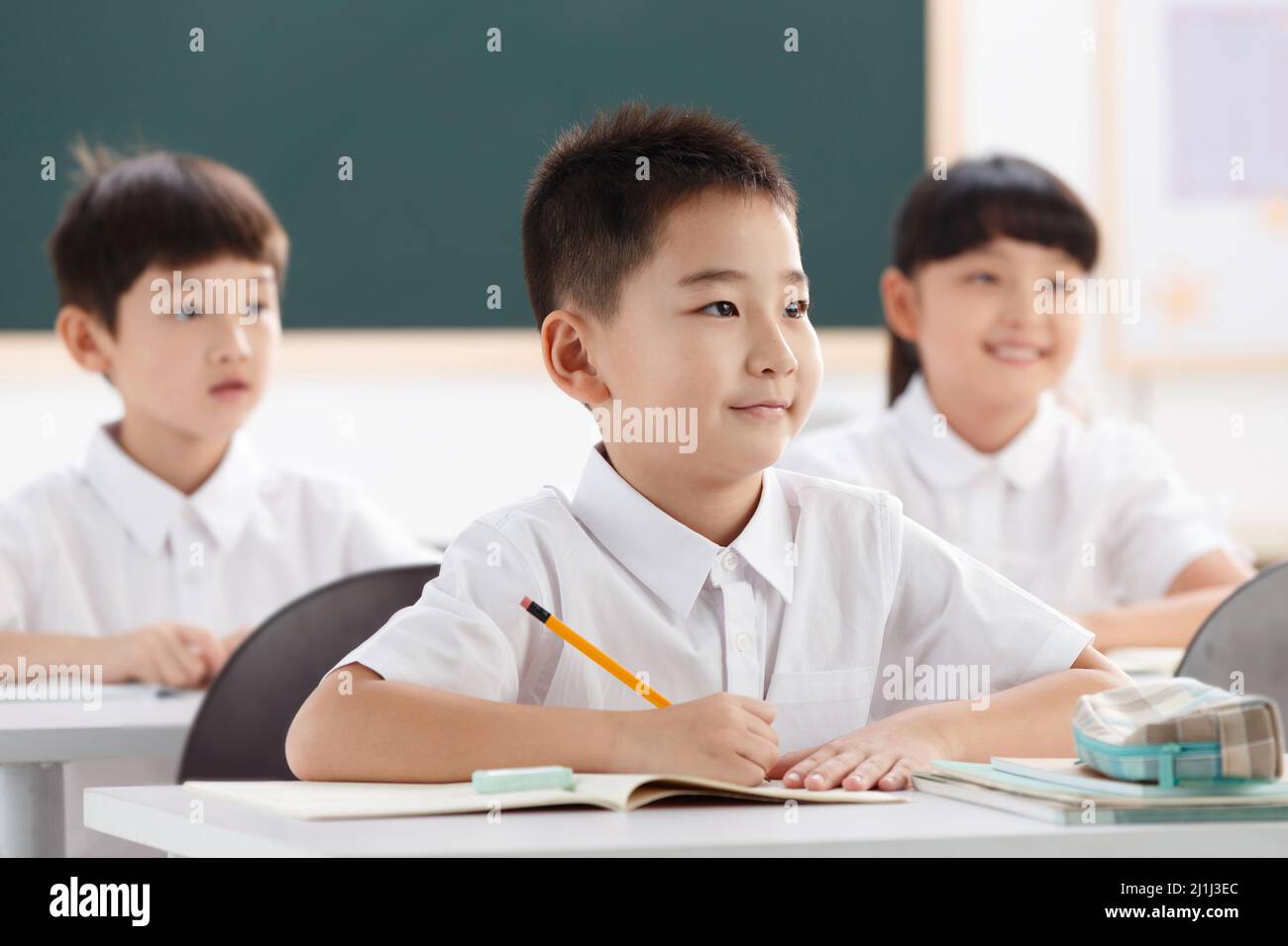 Pupils are learning in the classroom Stock Photo - Alamy