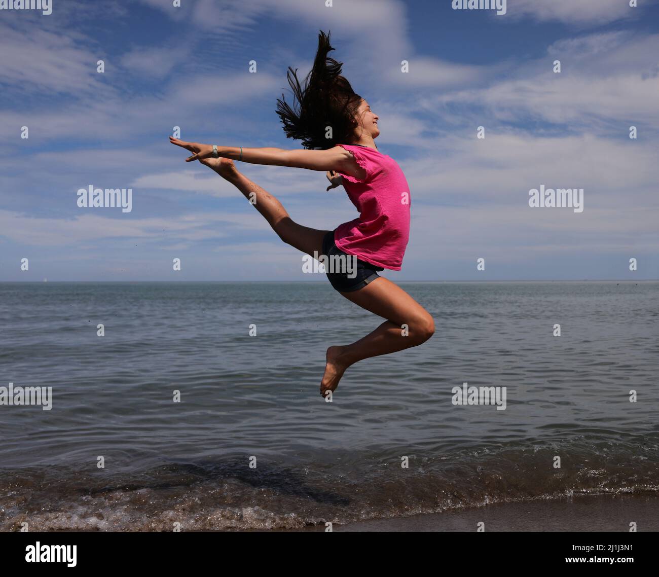 Child jumping up gymnastics hi-res stock photography and images - Alamy