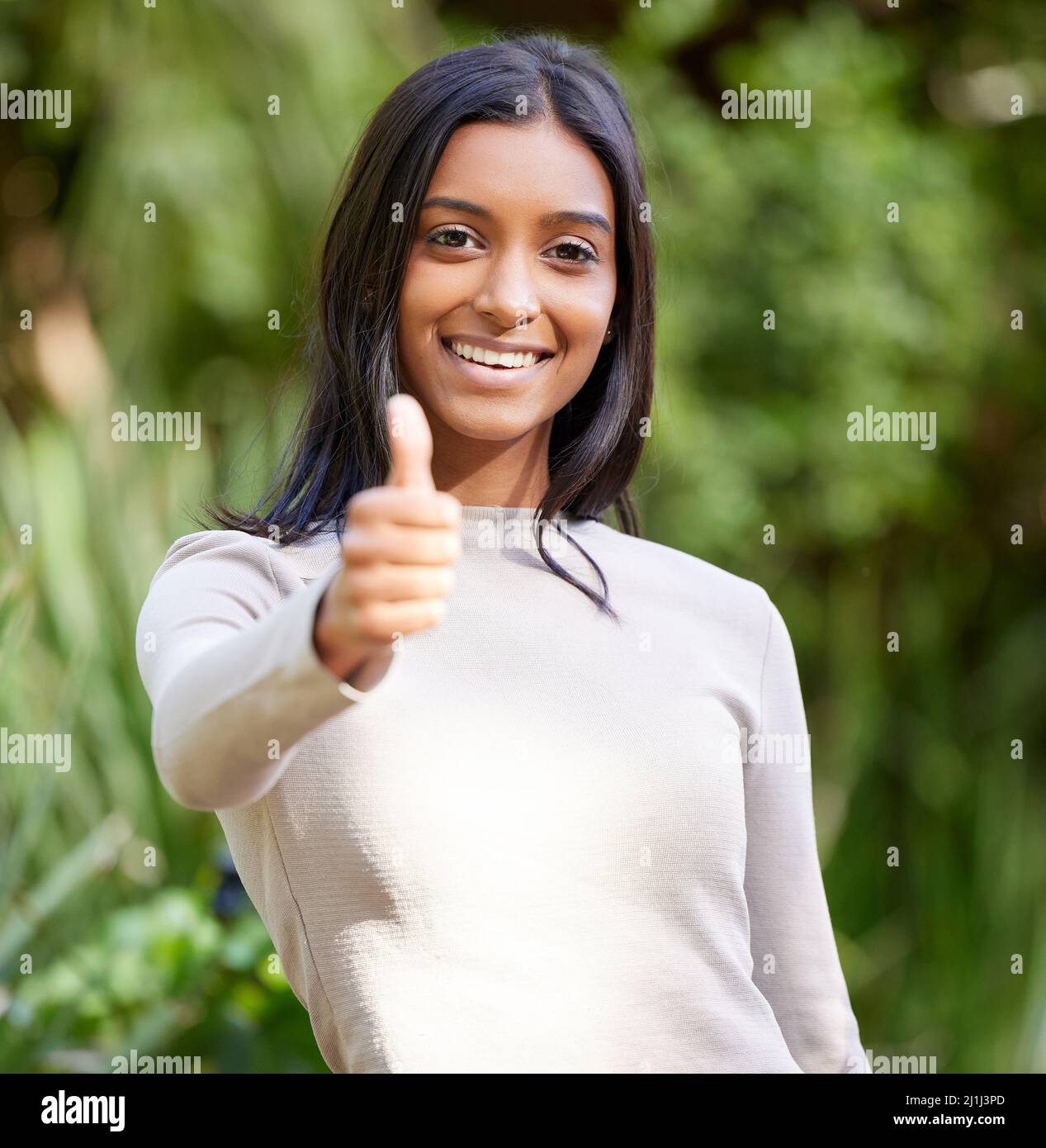 Indian adult woman thumbs up hi-res stock photography and images - Alamy