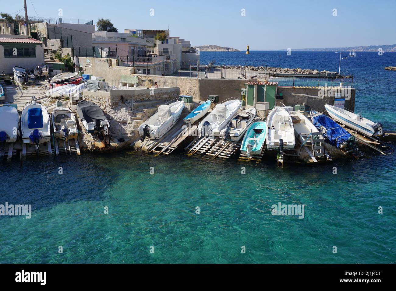 panoramic view of a small harbor with moored boats in Marseille, France ...