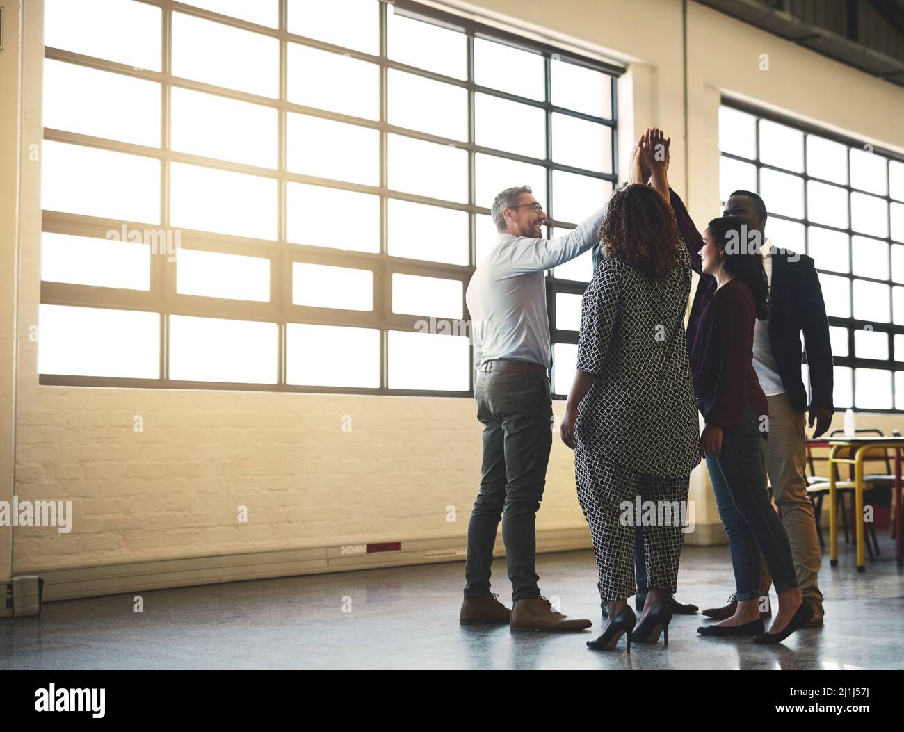 We feel good about the work we do. Shot of a diverse team of happy ...