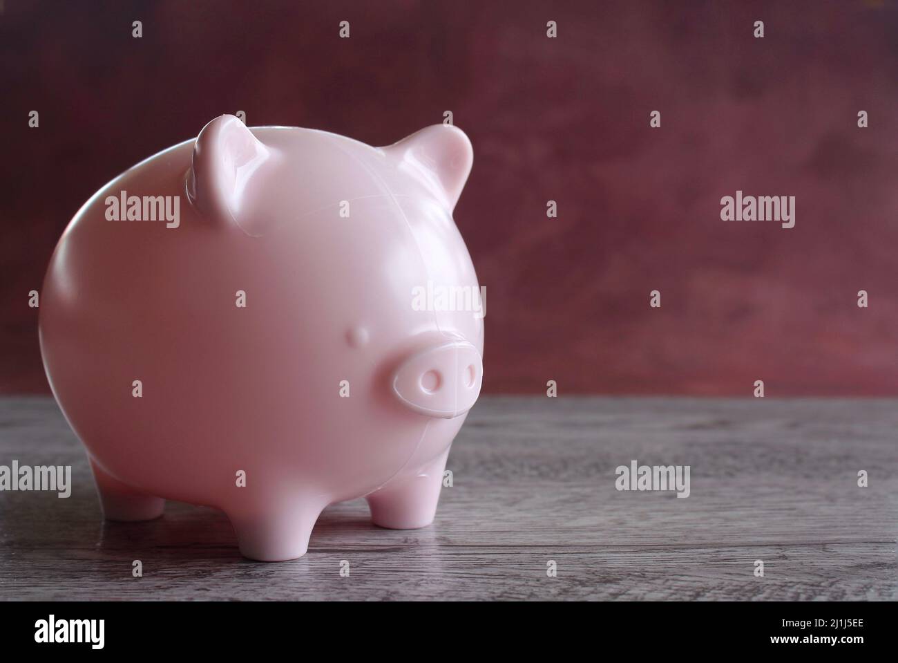 Piggy bank on table with copy space for text. Business, investment ...