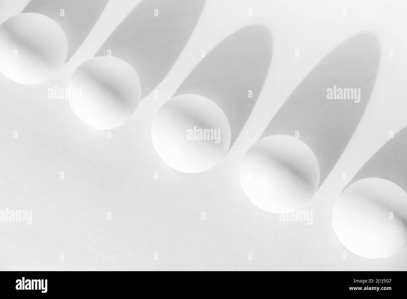 White eggshell. One row of eggshell halves arranged diagonally on a ...