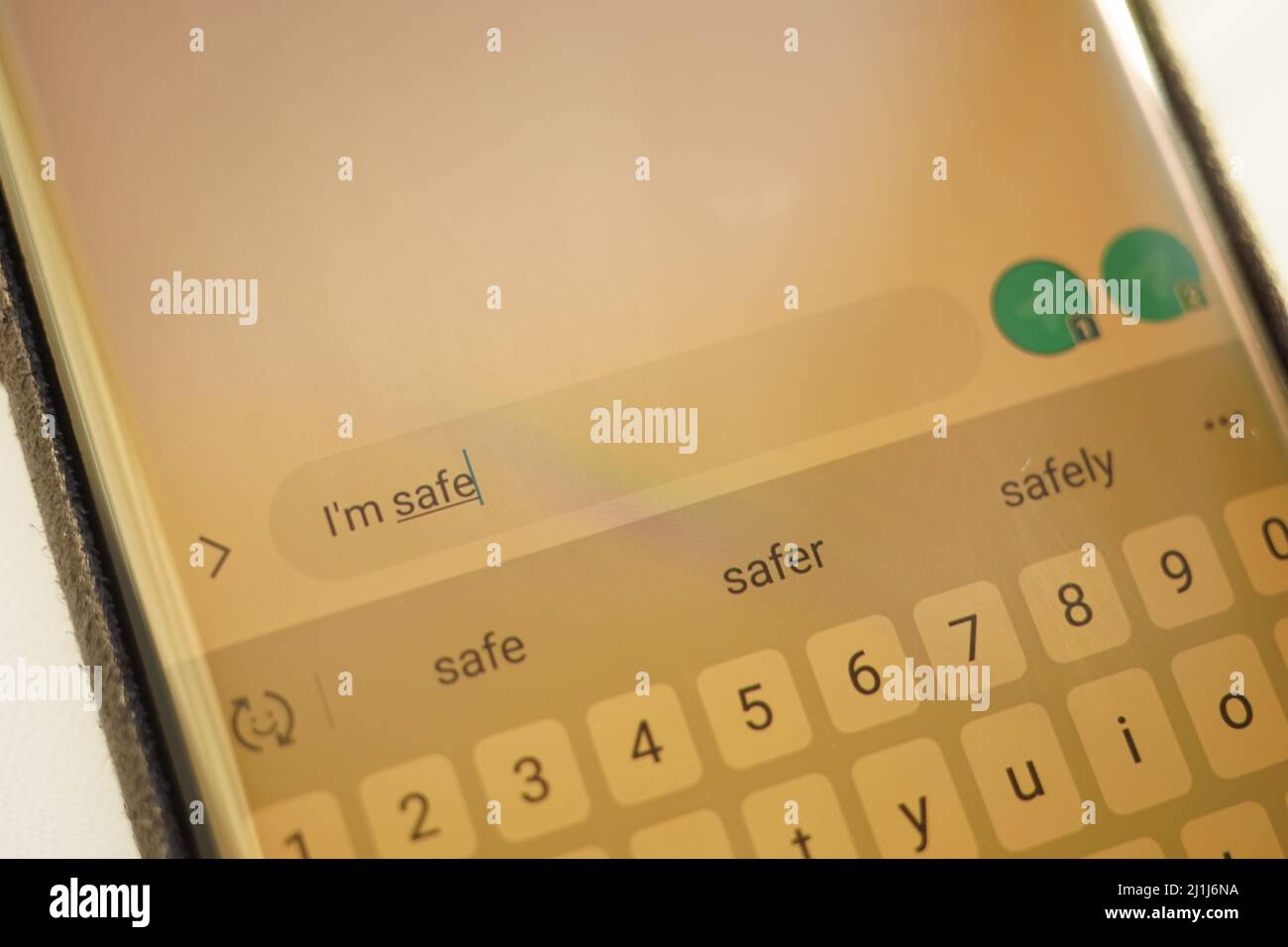 I'M SAFE message on white smartphone screen Stock Photo - Alamy