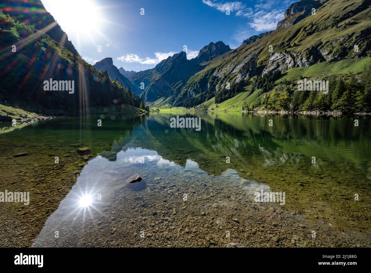 Scenic view on lake Seealpsee Stock Photo - Alamy