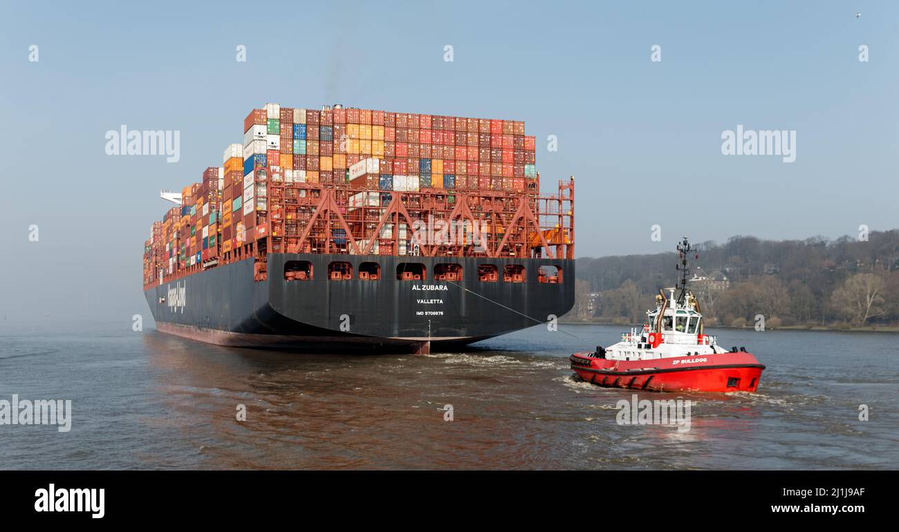 Hamburg, Germany. 25th Mar, 2022. The container ship Al Zubara is towed ...