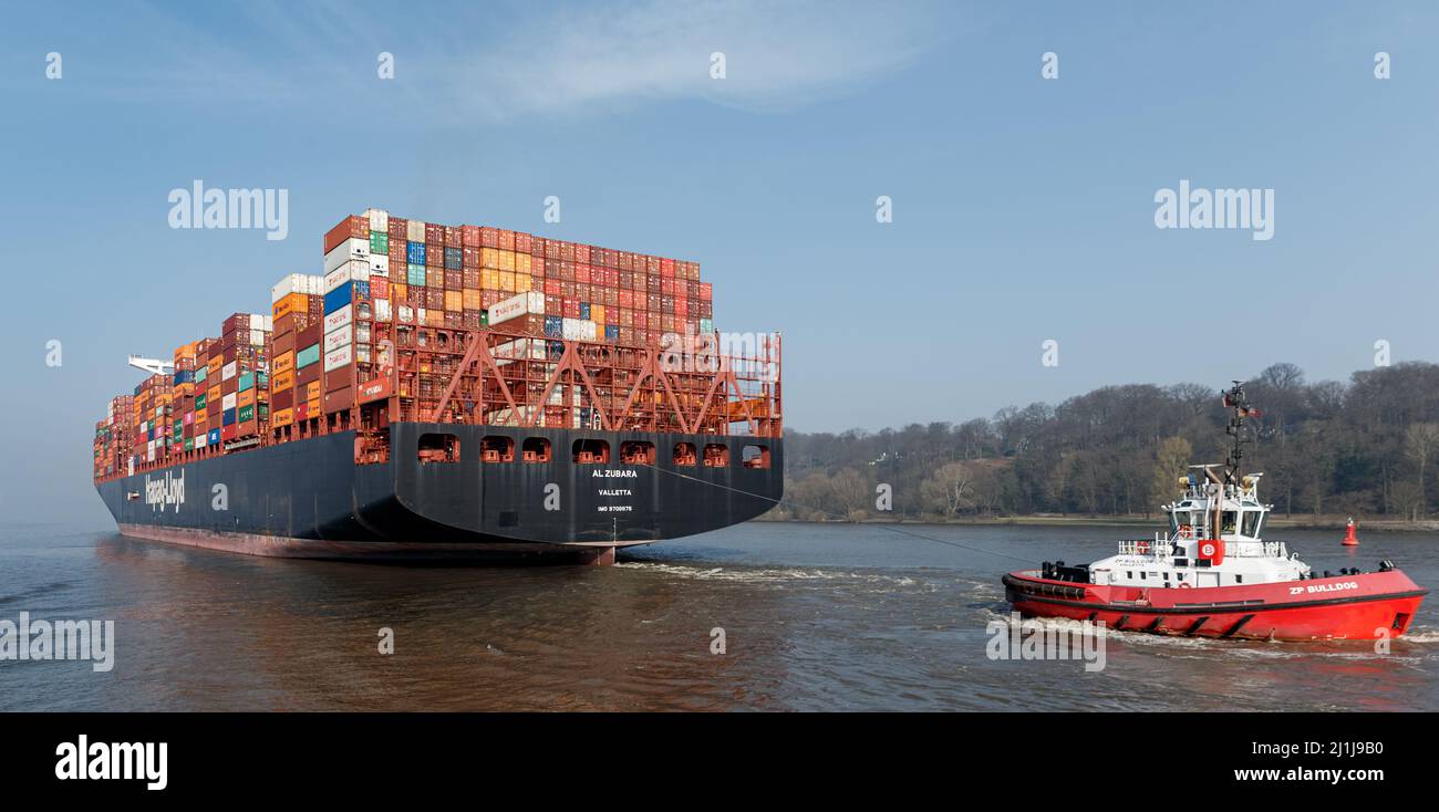 Hamburg, Germany. 25th Mar, 2022. The container ship Al Zubara is towed ...