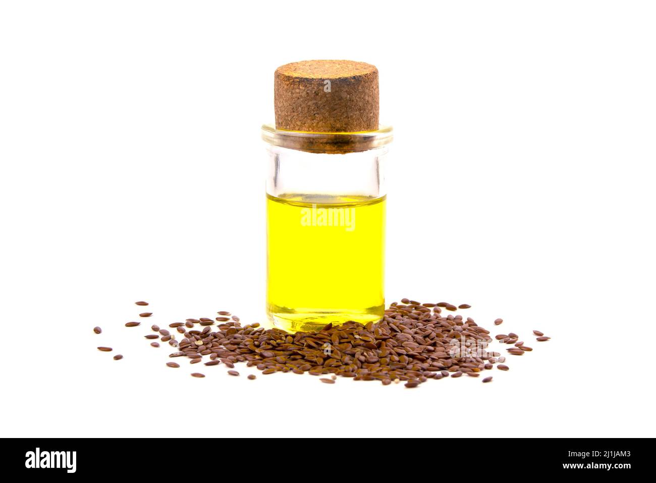 Bottle of linseed oil and linseeds isolated on white background Stock ...