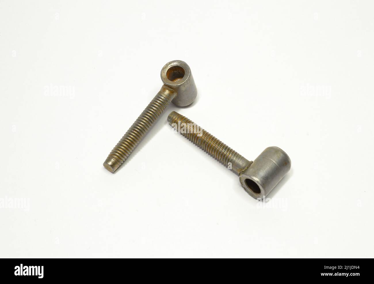 Metal bolts - fasteners on white background Stock Photo - Alamy