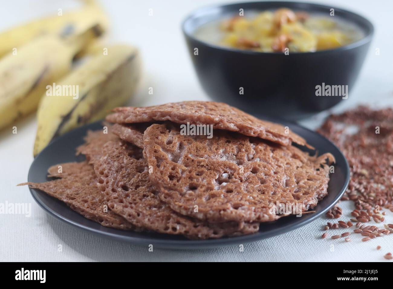 Red rice pancakes. Pancakes made of a fermented batter of red rice and ...