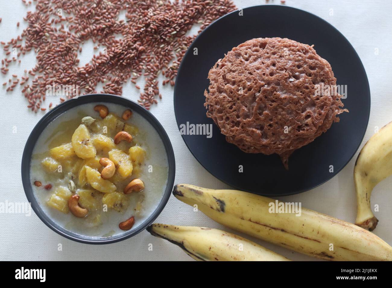 Red rice pancakes. Pancakes made of a fermented batter of red rice and ...