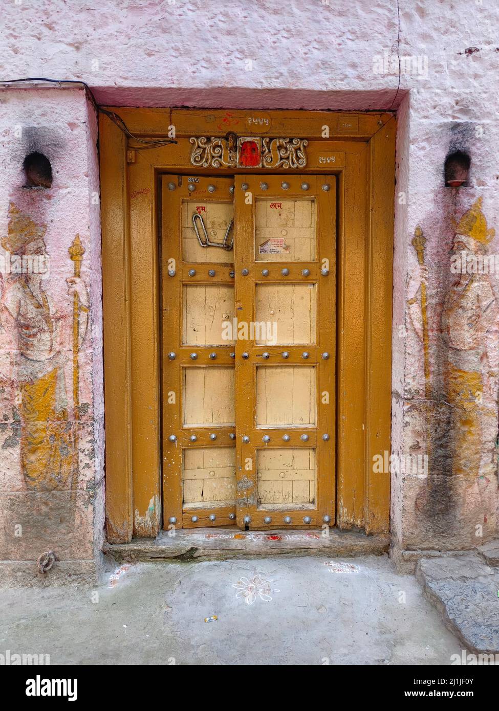 21 March 2022, Pandharpur, India, Old Vintage wooden door on retro wall ...