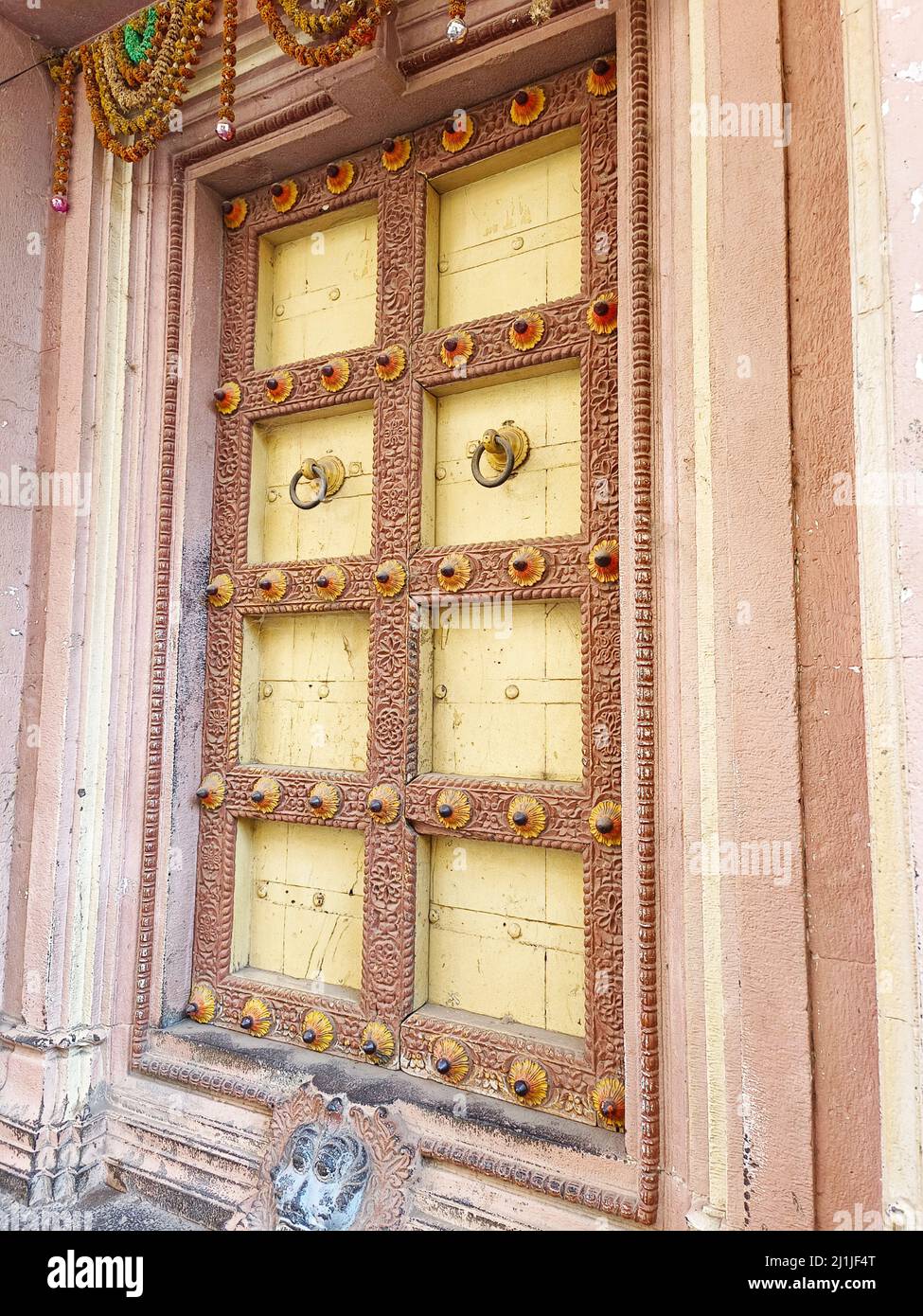 21 March 2022, Pandharpur, India, Old Vintage wooden door on retro wall ...